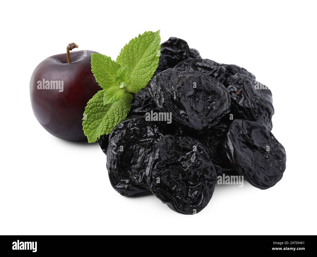 Delicious prunes, fresh ripe plums and mint isolated on white Stock ...