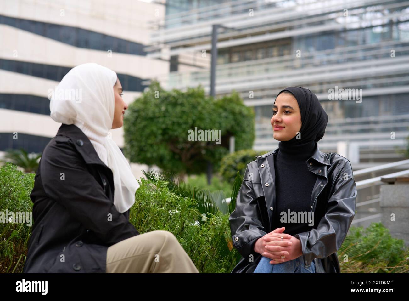 Happy muslim women in city hi-res stock photography and images - Alamy