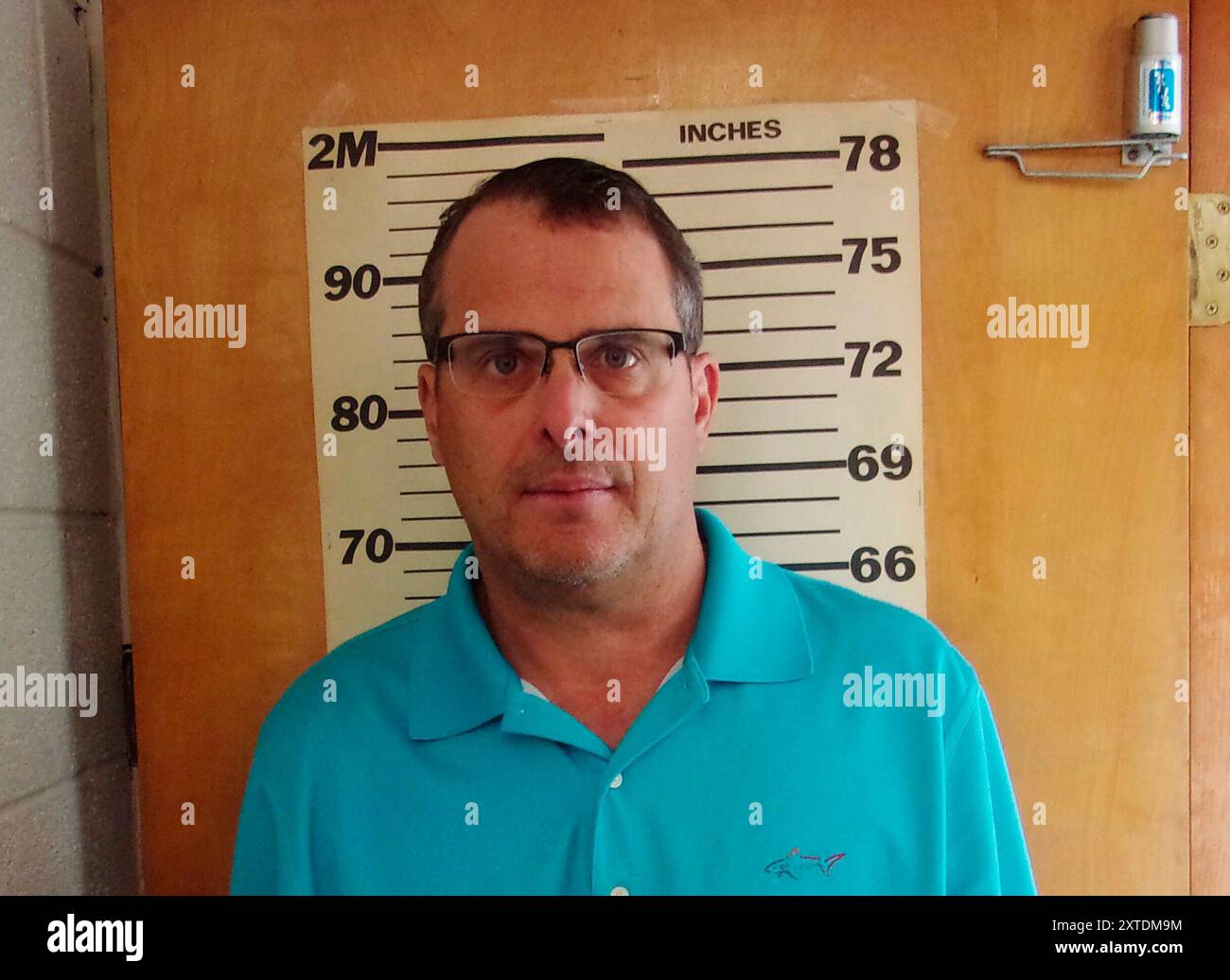 FILE - This undated booking photo provided by the Glen Dale Police ...