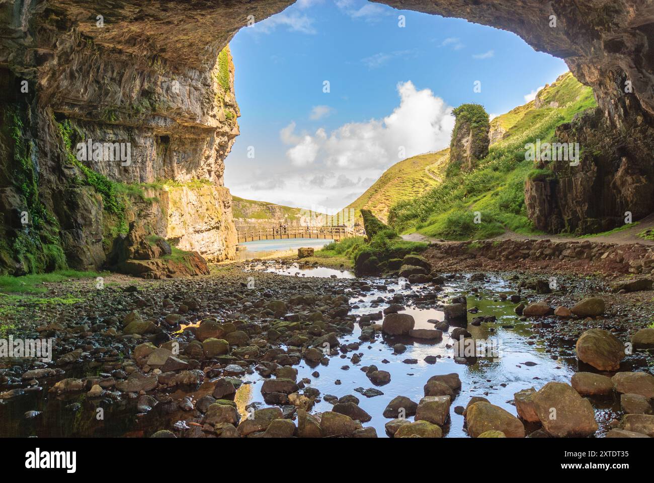 Discover the captivating landscape of Smoo Cave in the Highlands, where ...