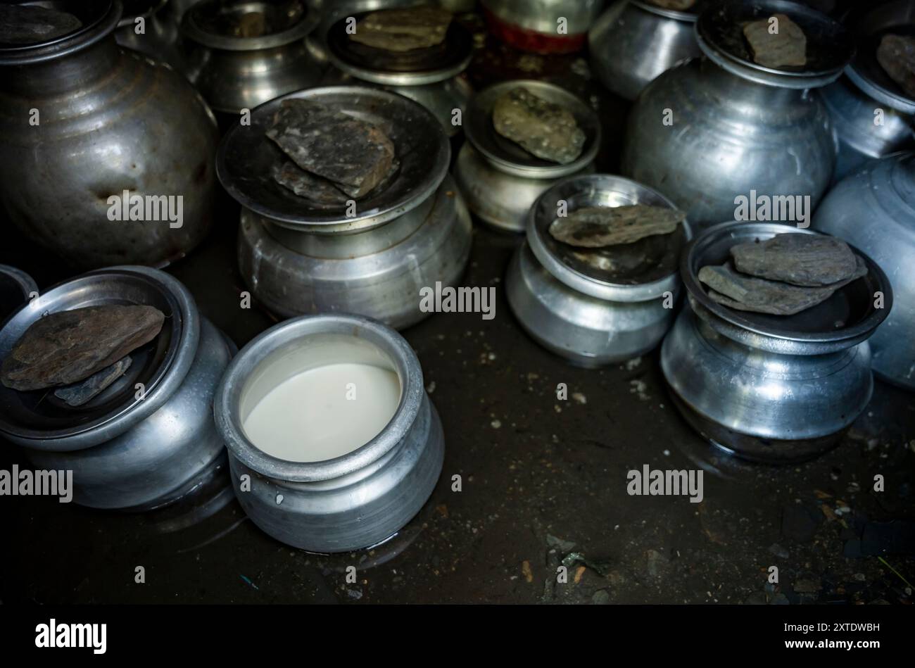 Utensils are seen inside a cave where milk is preserved in Dudran ...