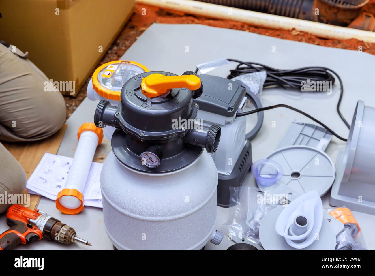 During maintenance, sand filter system tanks are assembled, as well ...