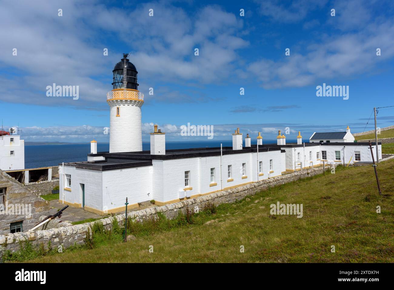 The historic Dunnet Head Lighthouse commands attention with its ...