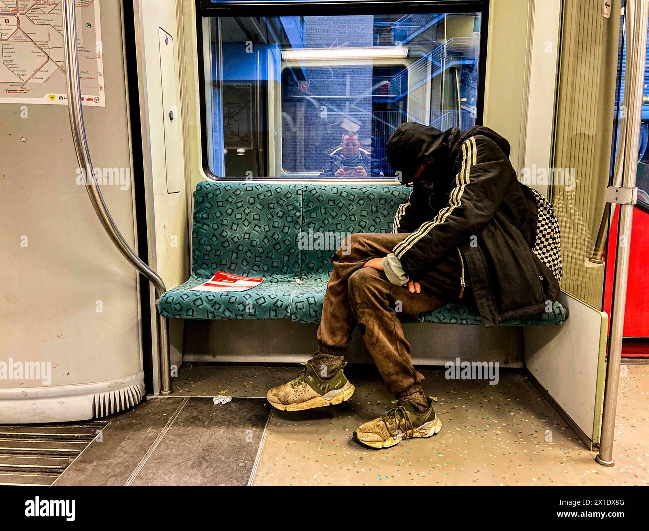 Man sitting down inside a train hi-res stock photography and images - Alamy