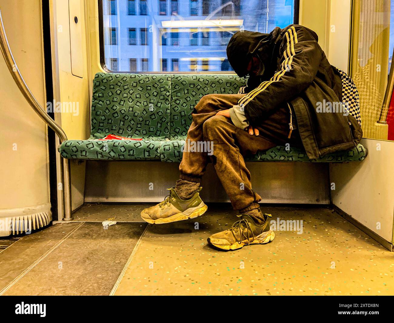Man sitting down inside a train hi-res stock photography and images - Alamy