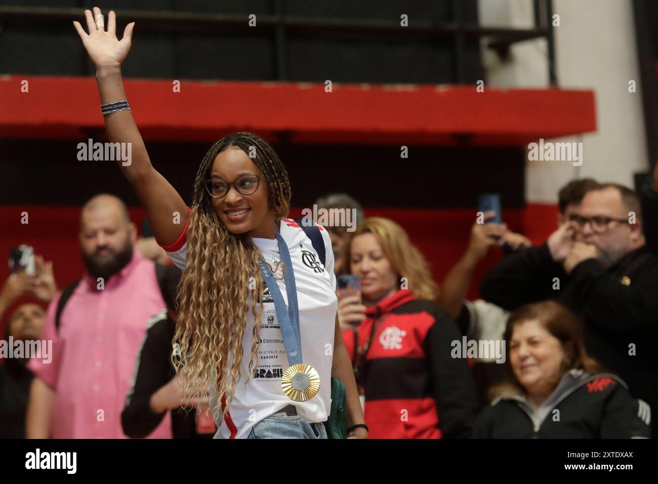 Gymnast Rebeca Andrade waves during a tribute to Brazilian Olympic ...