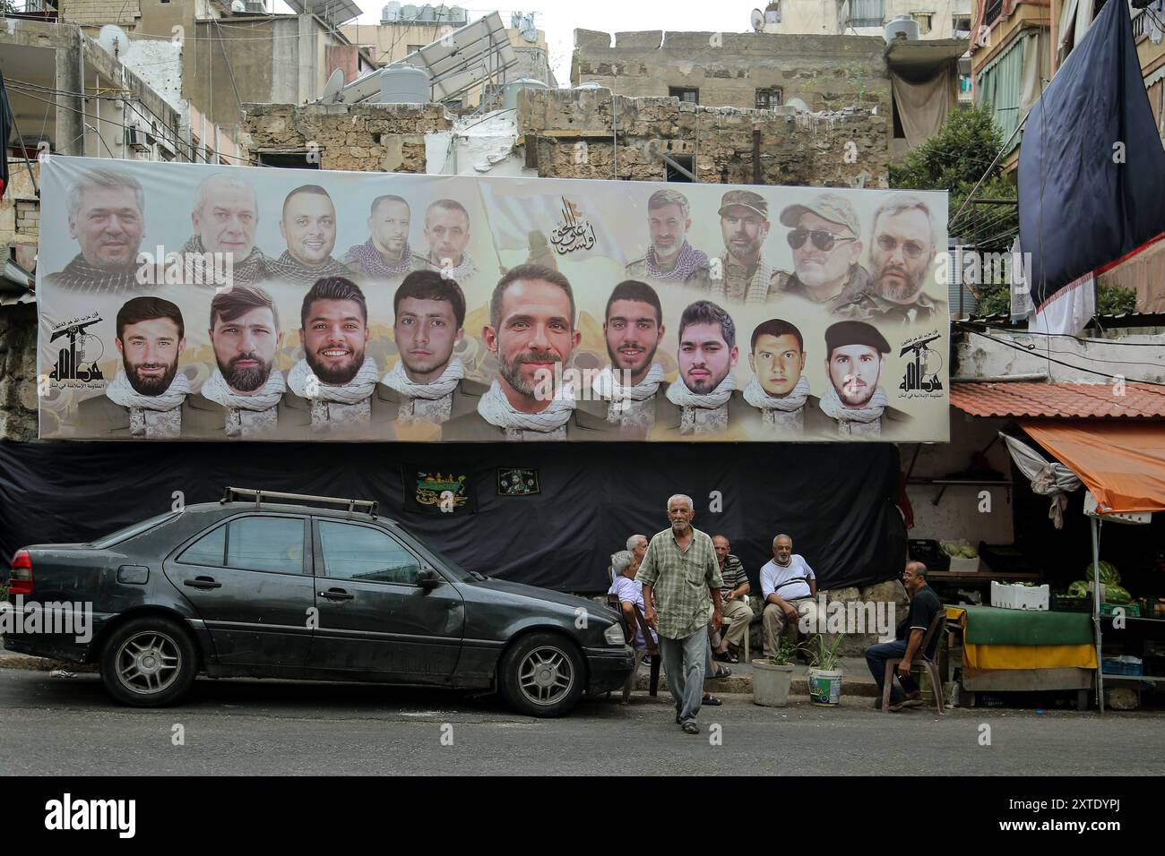 Beirut, Beirut, Lebanon. 14th Aug, 2024. Lebanese Muslim Shiite men sit ...