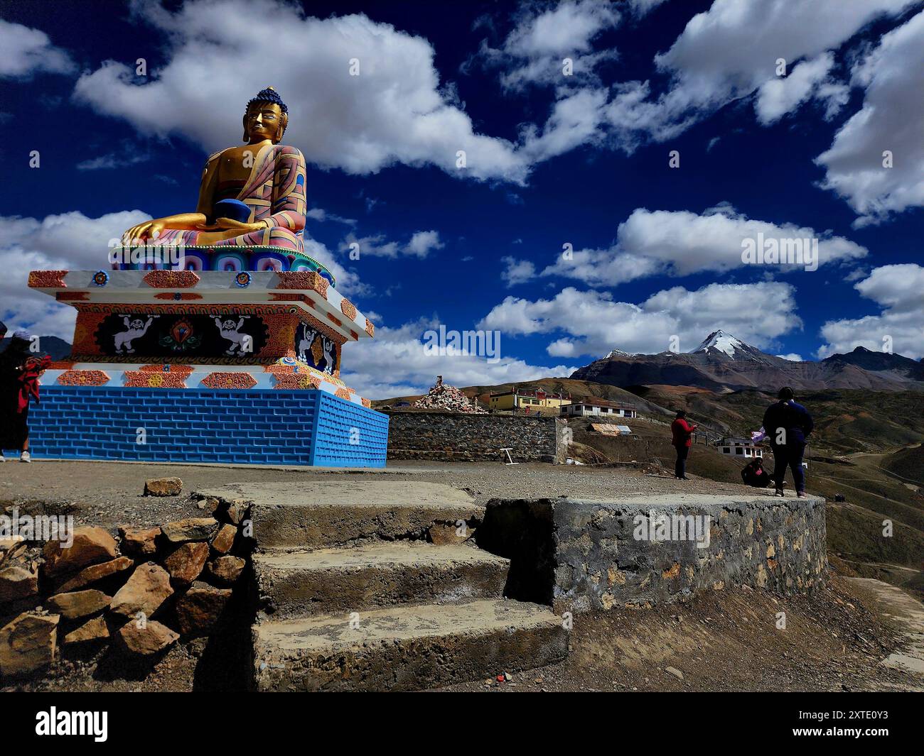 the statue of lord buddha in langza village in beautiful surroundings ...
