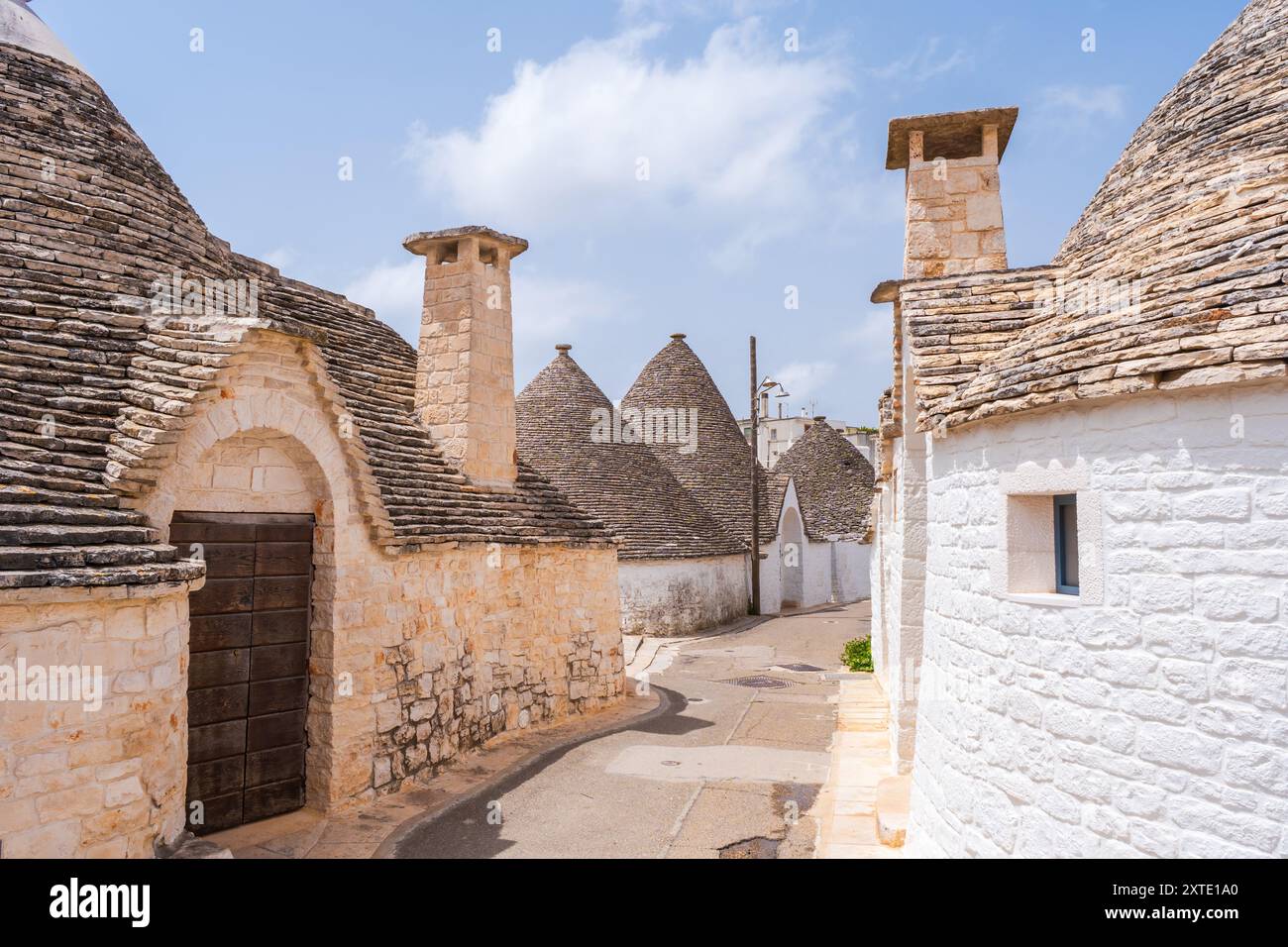 Famous historical old dry stone trulli houses with conical roofs in ...