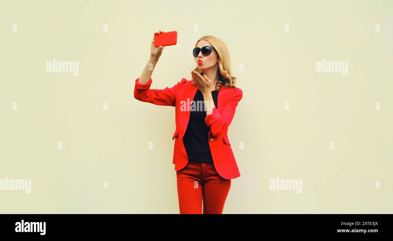 Portrait of beautiful elegant lady woman taking selfie with smartphone ...