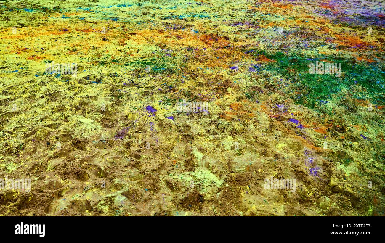 "Painted" sand on beach after charity Colour Run Stock Photo - Alamy