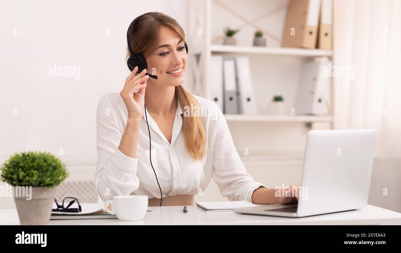 Entrepreneur Lady In Headset Making Video Call Sitting In Office Stock ...