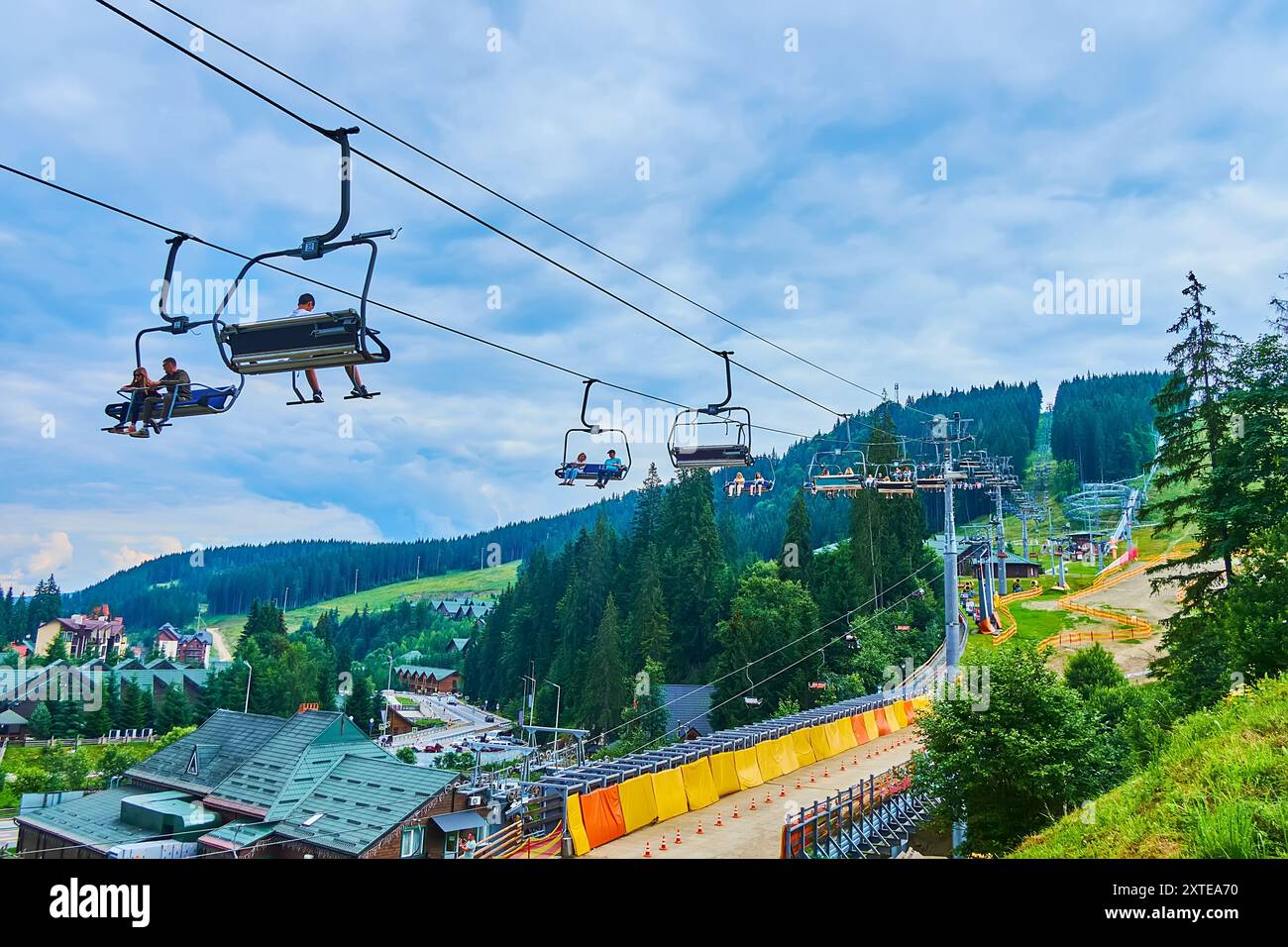 BUKOVEL, UKRAINE - JULY 24, 2021: The skilift, riding to the Mount ...