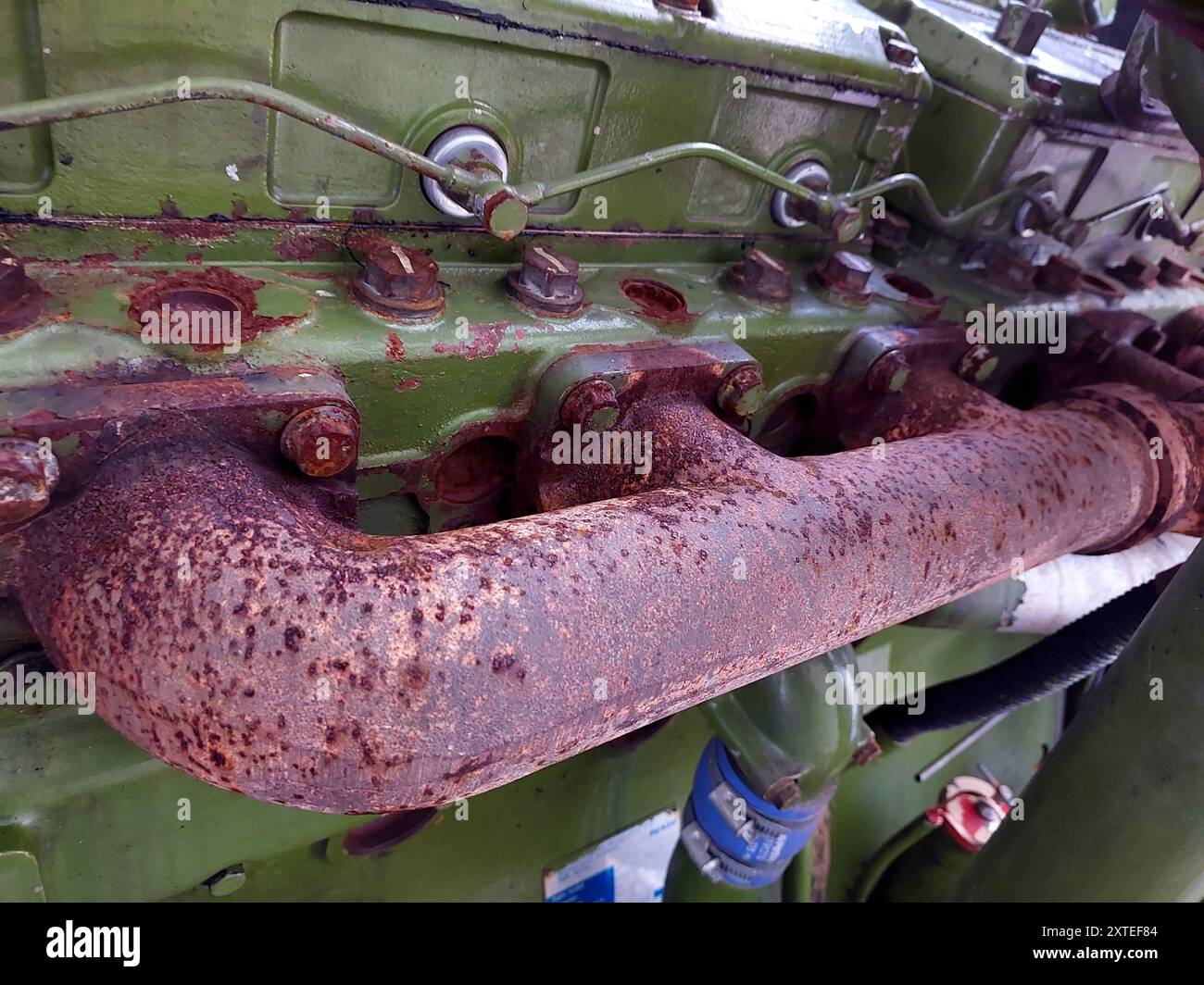 A diesel engine of an electric generator is shown with a flue gas ...