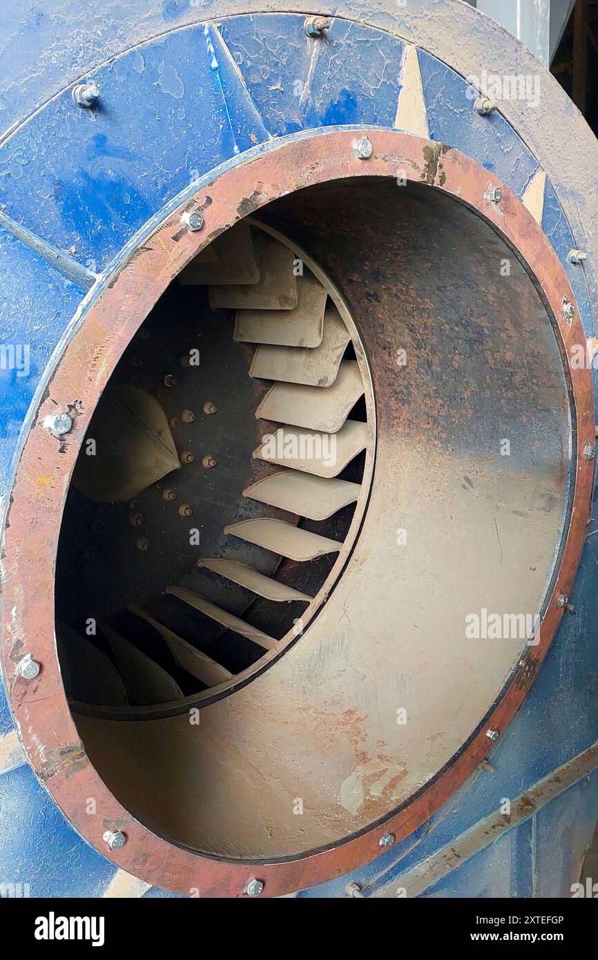 A close-up view of an industrial exhaust fan impeller showing its ...