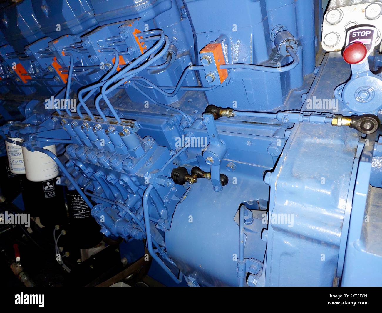 A powerful diesel engine is connected to an electric generator ...