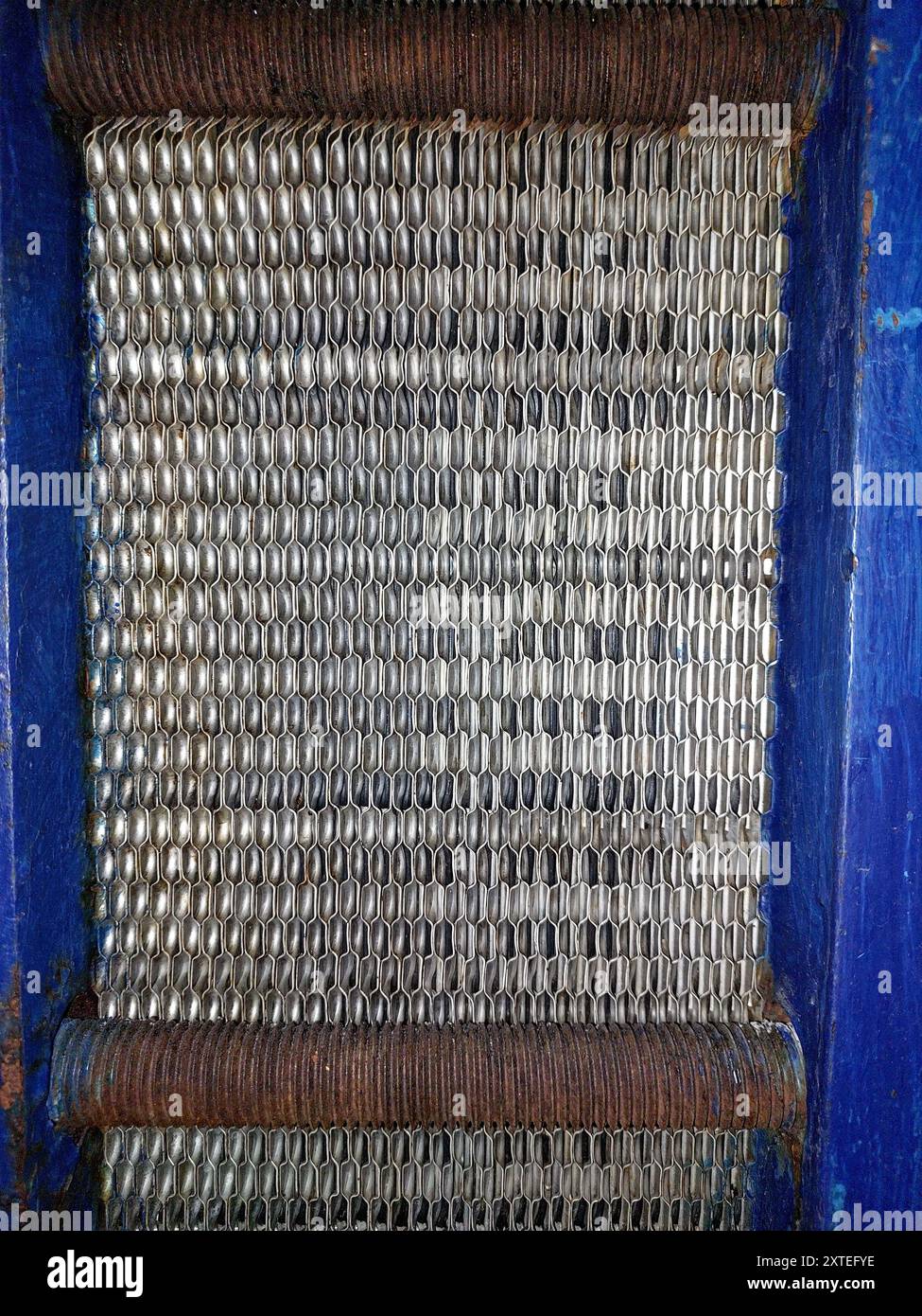 A side view of a plate heat exchanger assembly, highlighting the ...