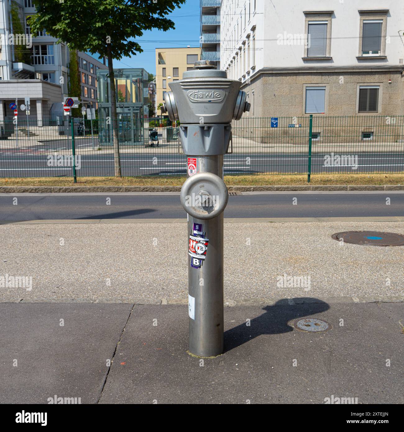 Linz, Austria. August 12, 2024. in a fire hydrant on a sidewalk in the ...