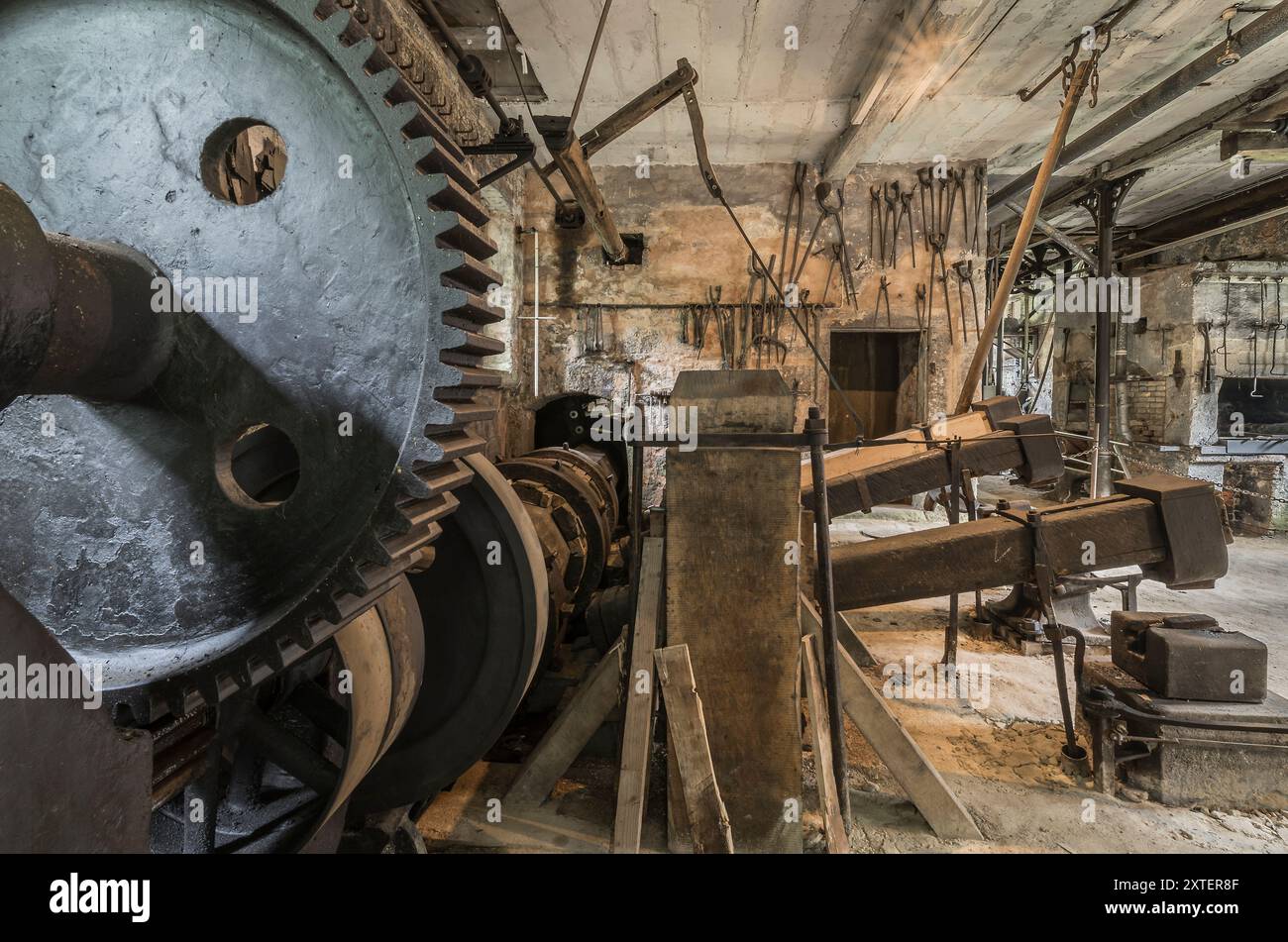 Workshop of a historic hammer mill smithy Stock Photo - Alamy