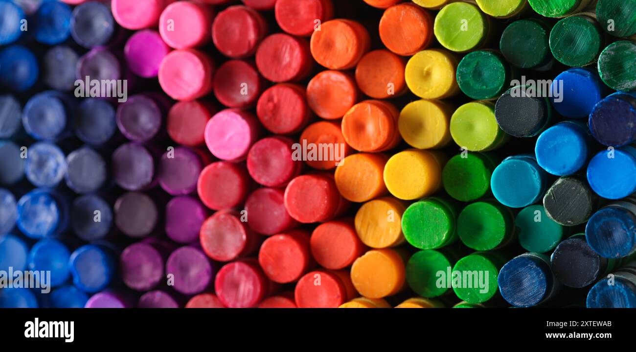 Box of crayons in a rainbow of colors background Stock Photo - Alamy