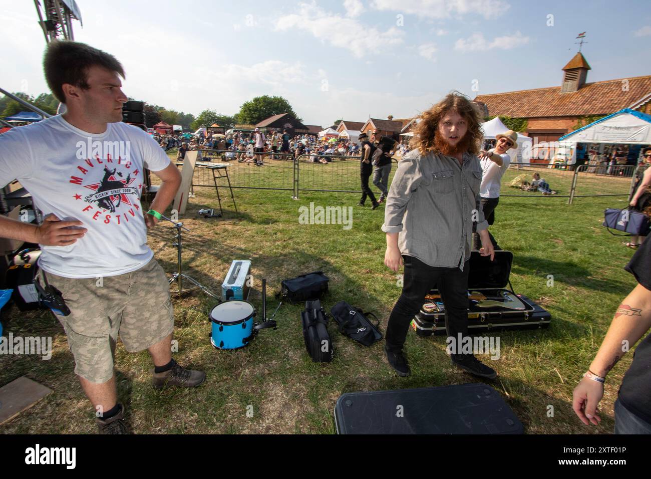 Roadies, stage managers, musicians and others at the side of the 2018 ...