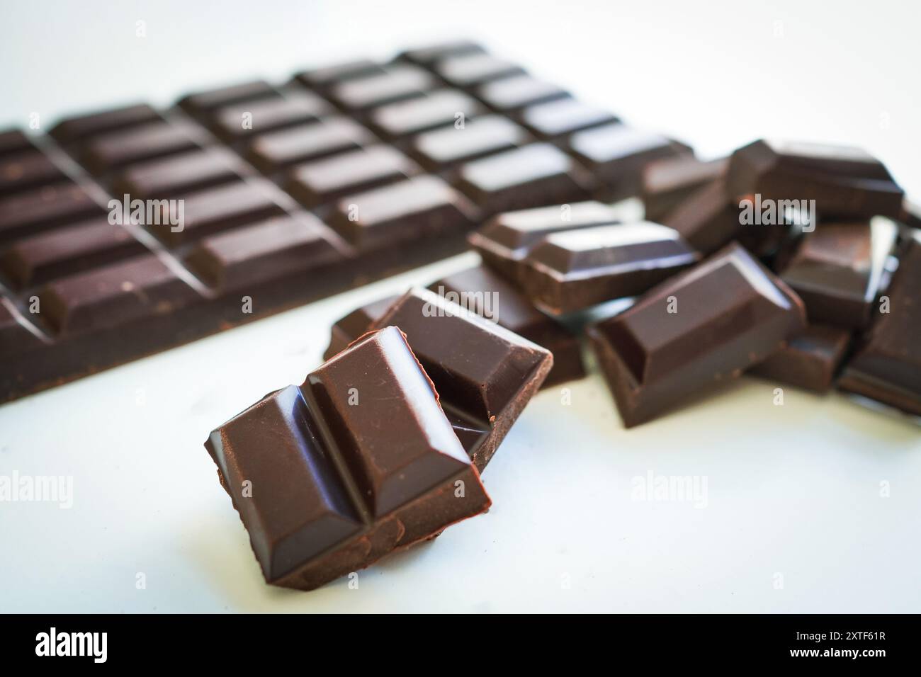 Baking ingredients, chocolate bar on white background Stock Photo - Alamy