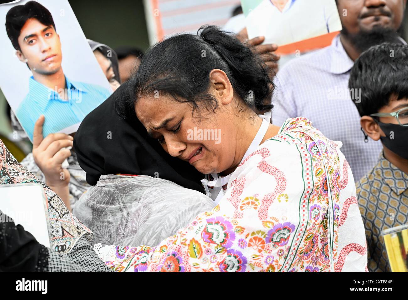 Dhaka, Bangladesh. 14th Aug, 2024. Family members of the victims of ...