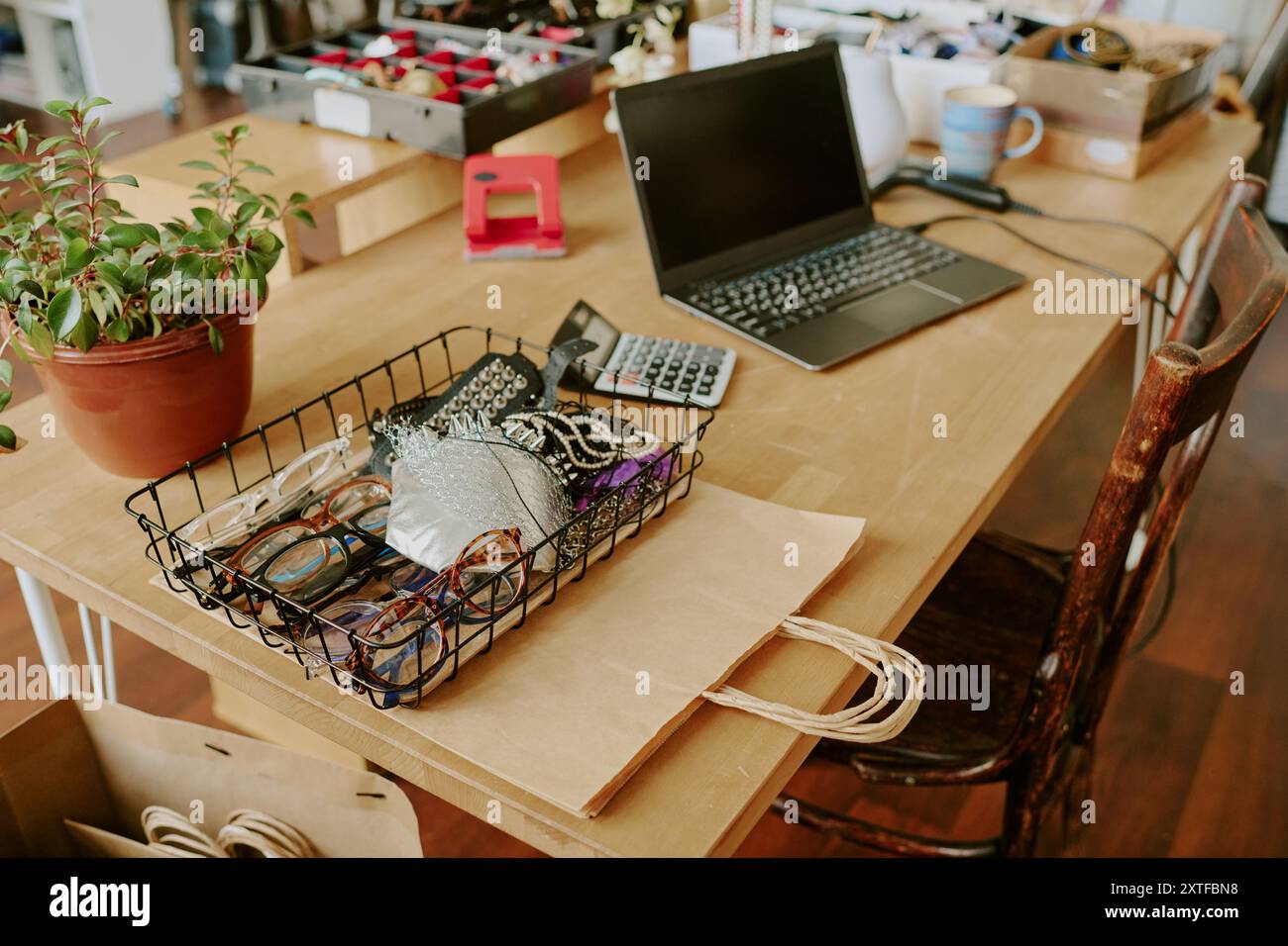 Organizing Work Desk with Office Supplies and Laptop Stock Photo - Alamy
