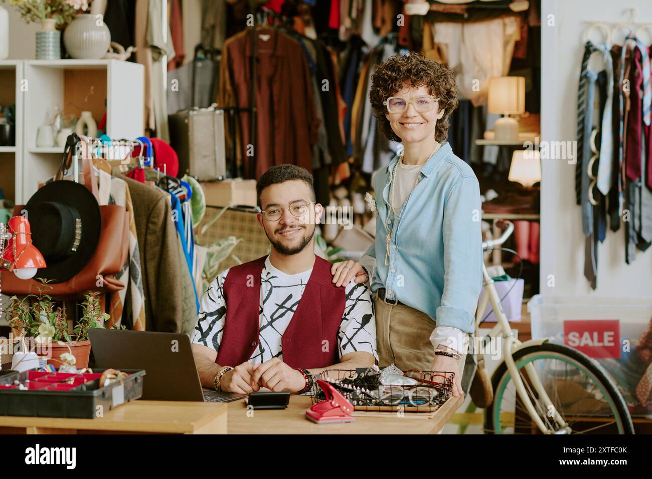 Diverse People Smiling in Vintage Clothing Store Stock Photo - Alamy