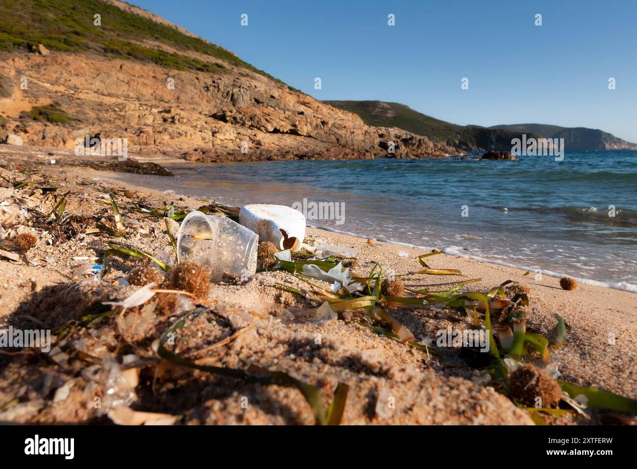 Close up plastic pollution on a mediterranean sea. Beach polluted with ...