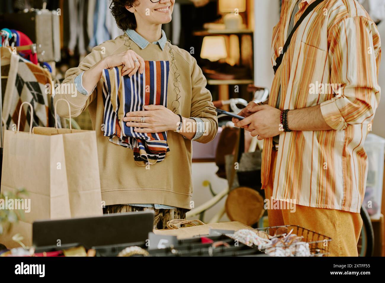 Two Young Men Engaging in Conversation While Shopping Stock Photo - Alamy