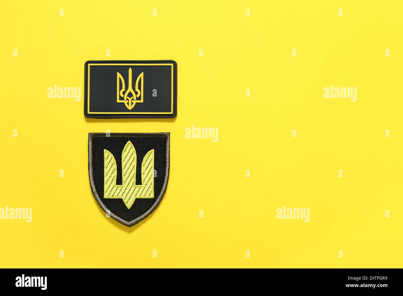 Different military badges of Ukrainian army with trident on yellow ...