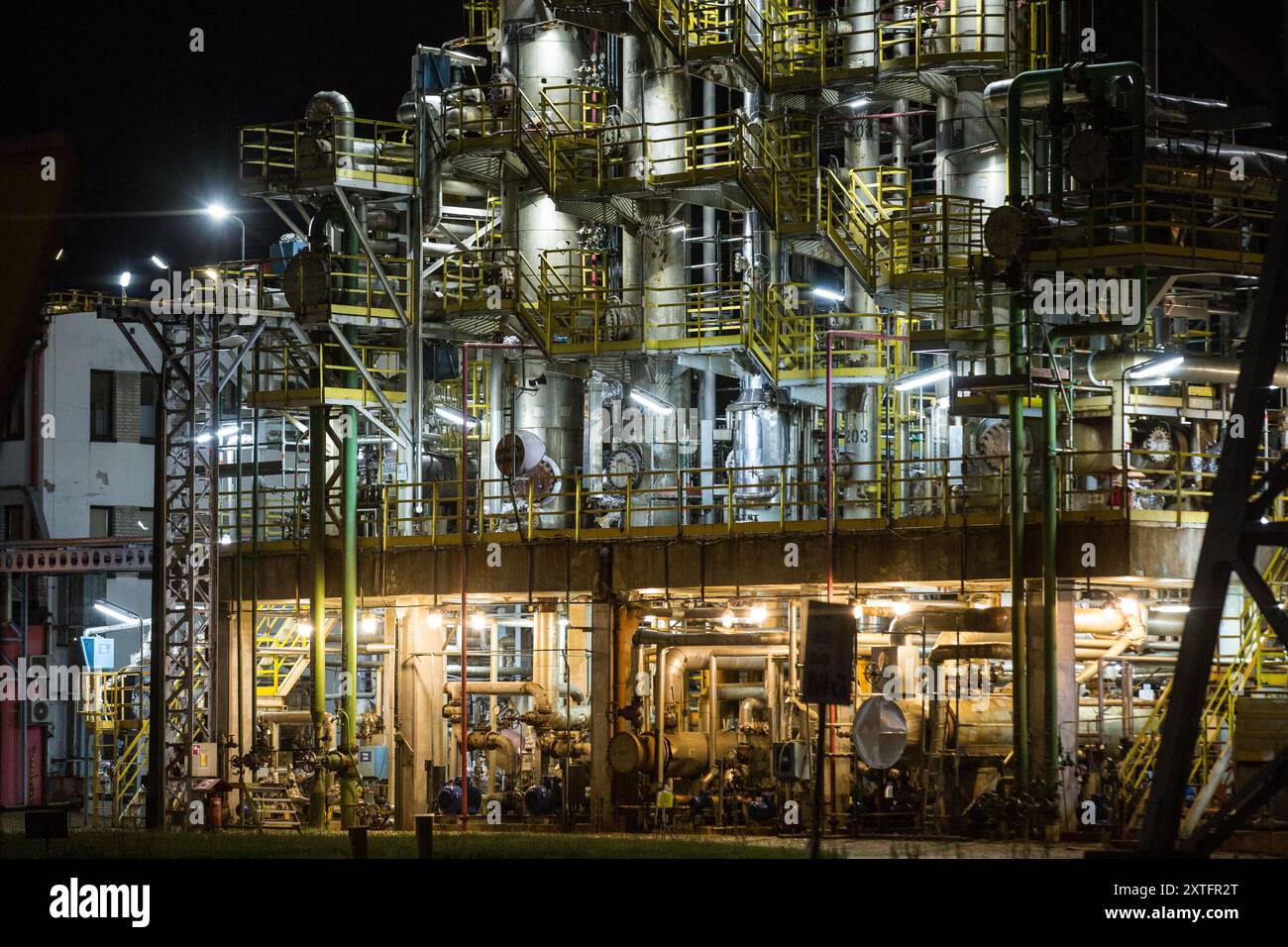 A view of the extensive pipeline network of the PKN Orlen refinery. The ...