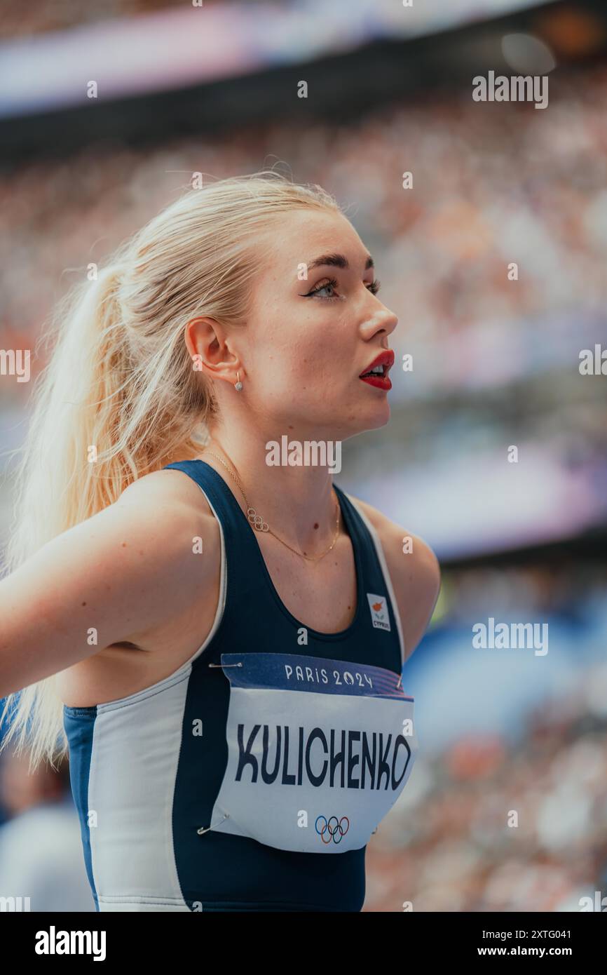Elena Kulichenko participating in the high jump at the Paris 2024 ...