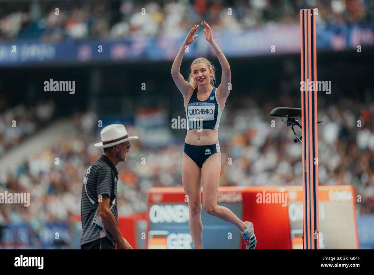Elena Kulichenko participating in the high jump at the Paris 2024 ...