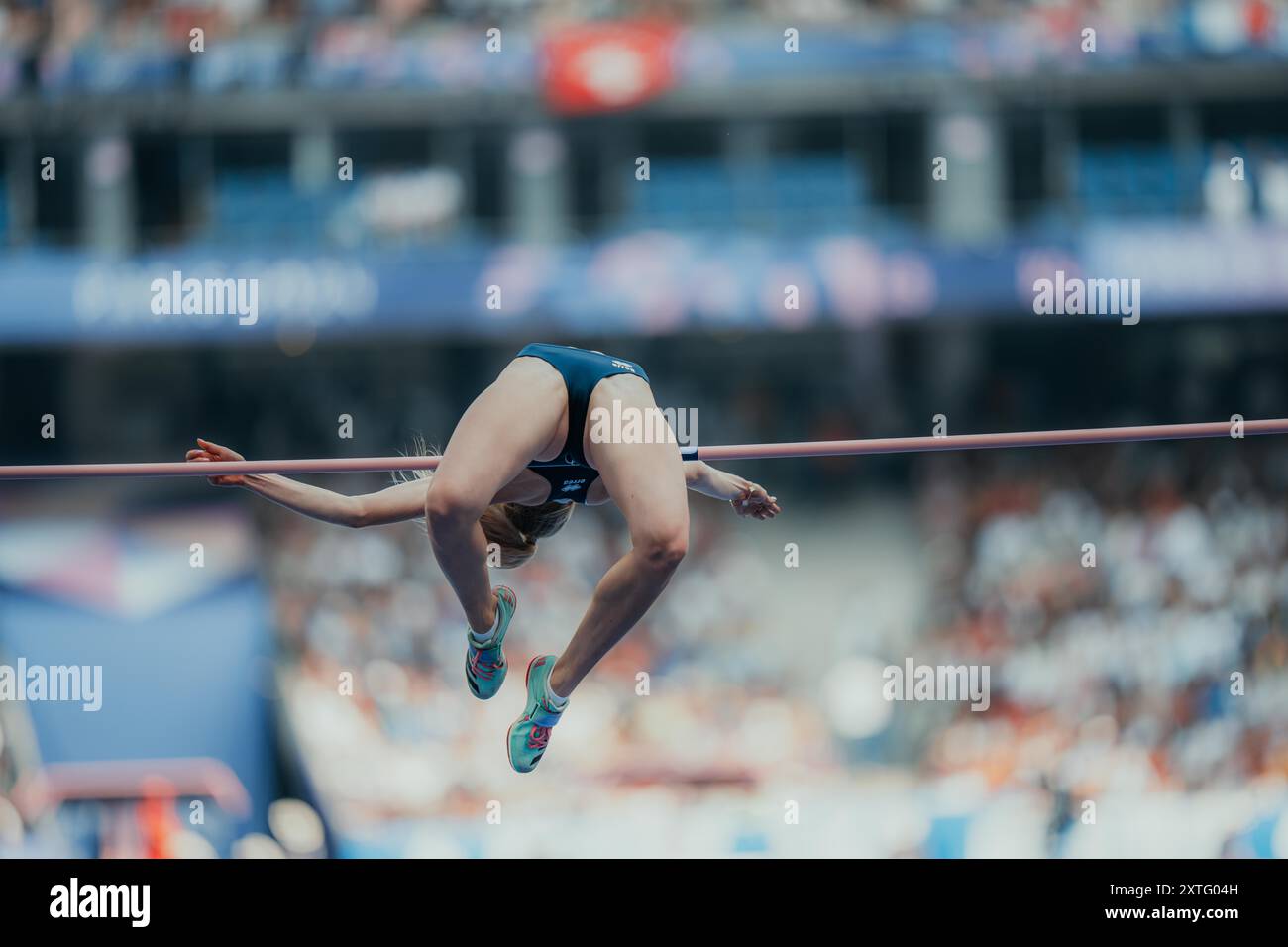 Elena Kulichenko participating in the high jump at the Paris 2024 ...