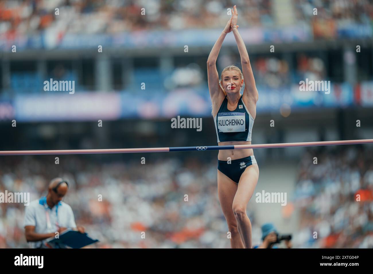 Elena Kulichenko participating in the high jump at the Paris 2024 ...
