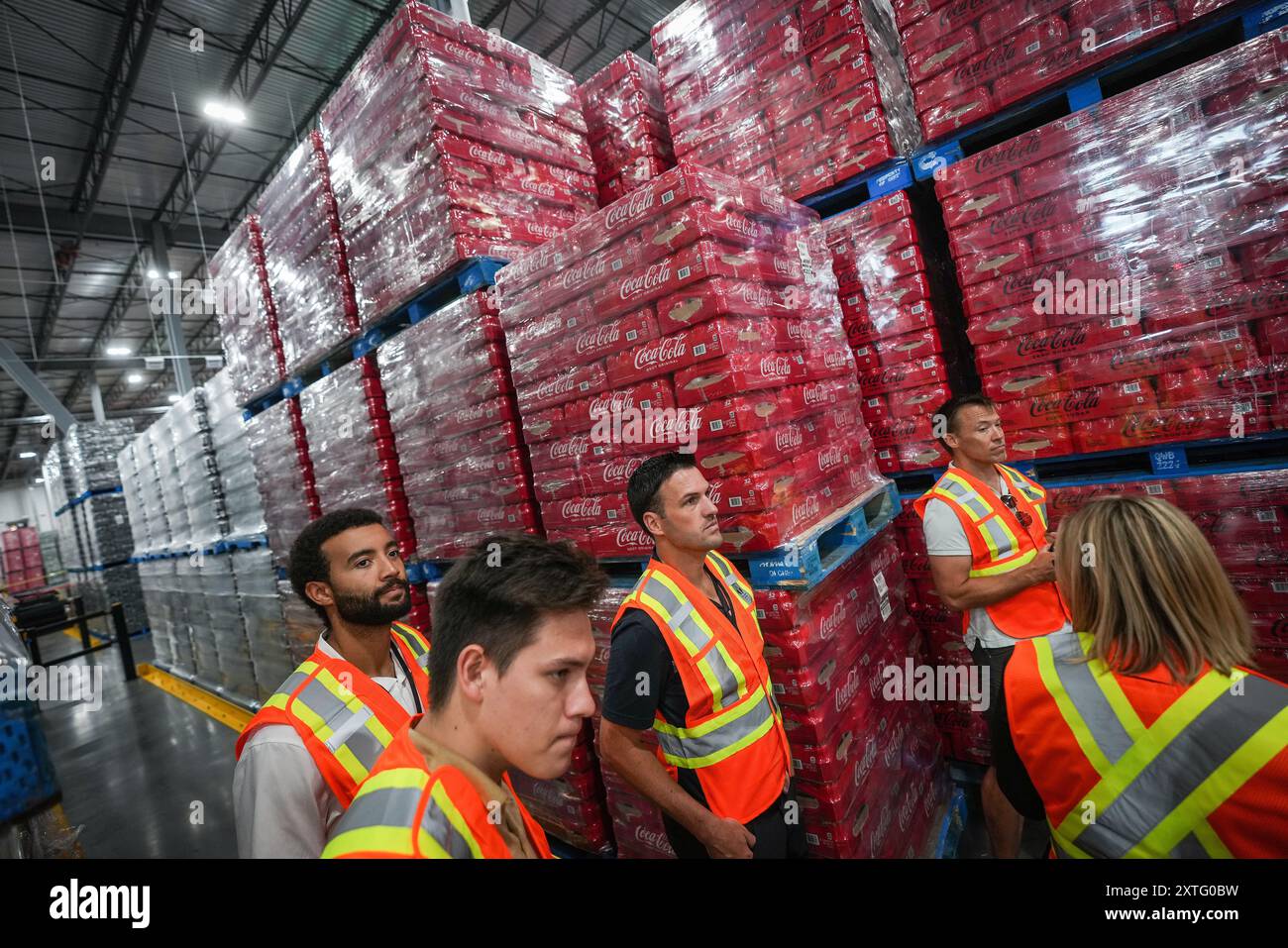 Richmond, Canada. 14th Aug, 2024. Stacks of Coca-Cola products are seen ...