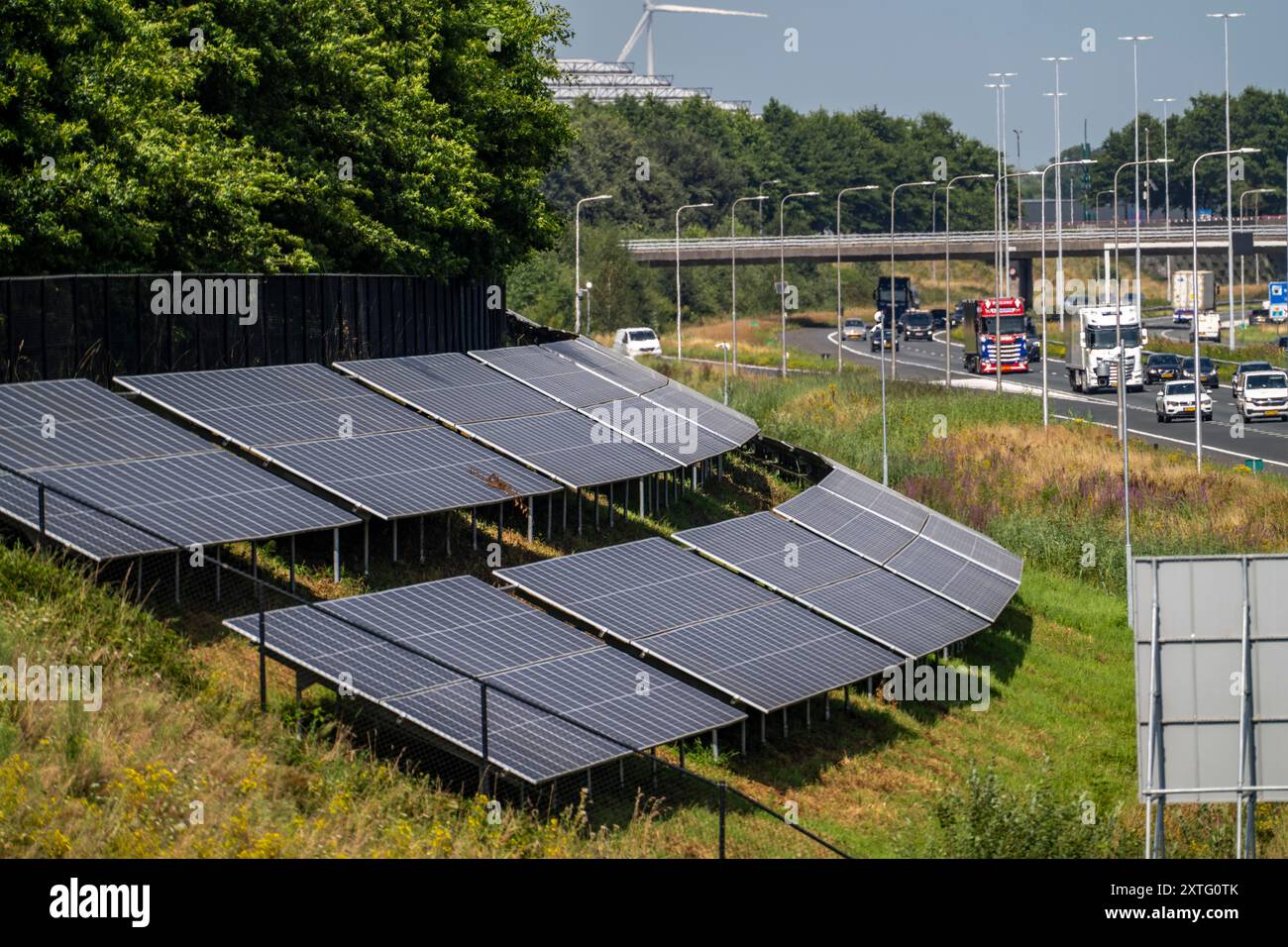 A58 highway, photovoltaic systems installed on the slopes to the side ...