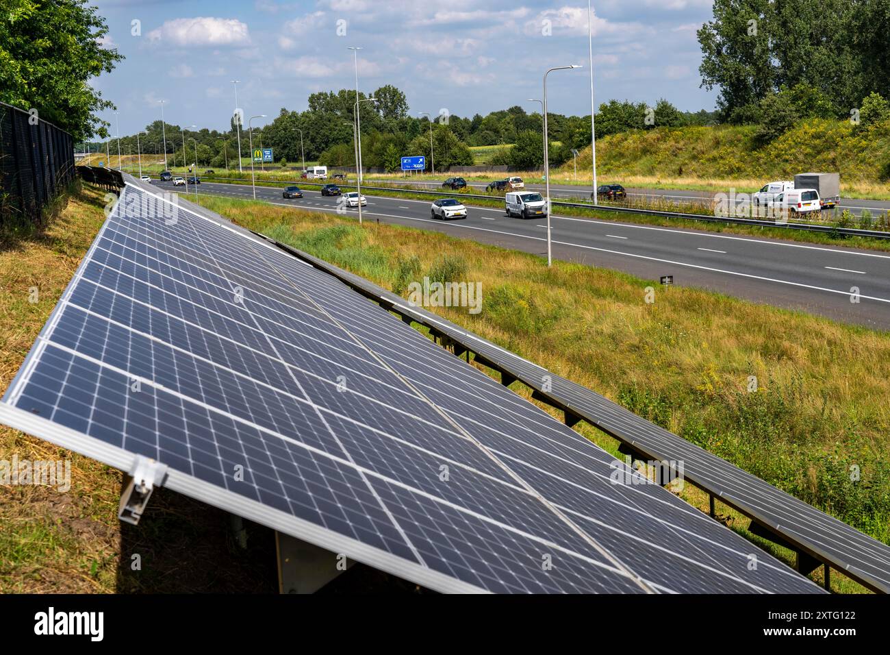 A58 highway, photovoltaic systems were installed on the slopes to the ...
