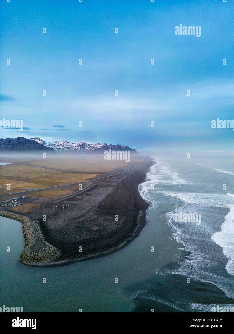 Aerial view of atlantic ocean with black sand beach in icelandic ...