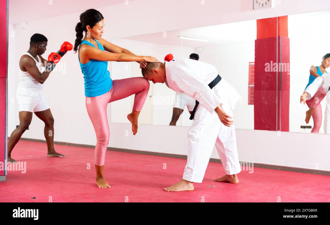 Self-defense lesson for women in gym. Power grabs and strikes Stock ...