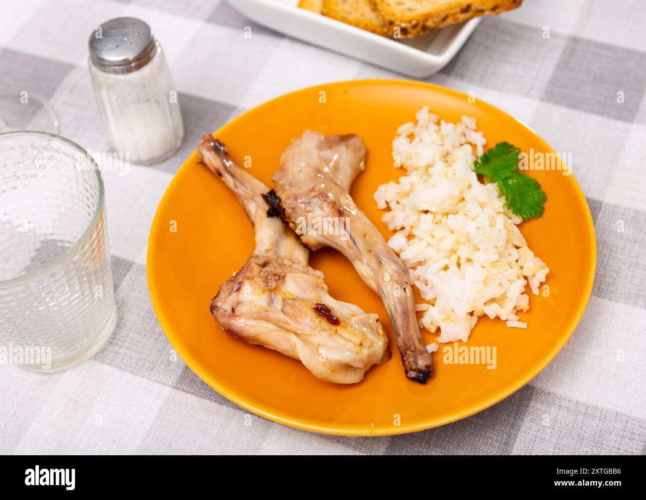 Tasty eal of rabbit paired with rice, ideal for nutritious and dietary ...