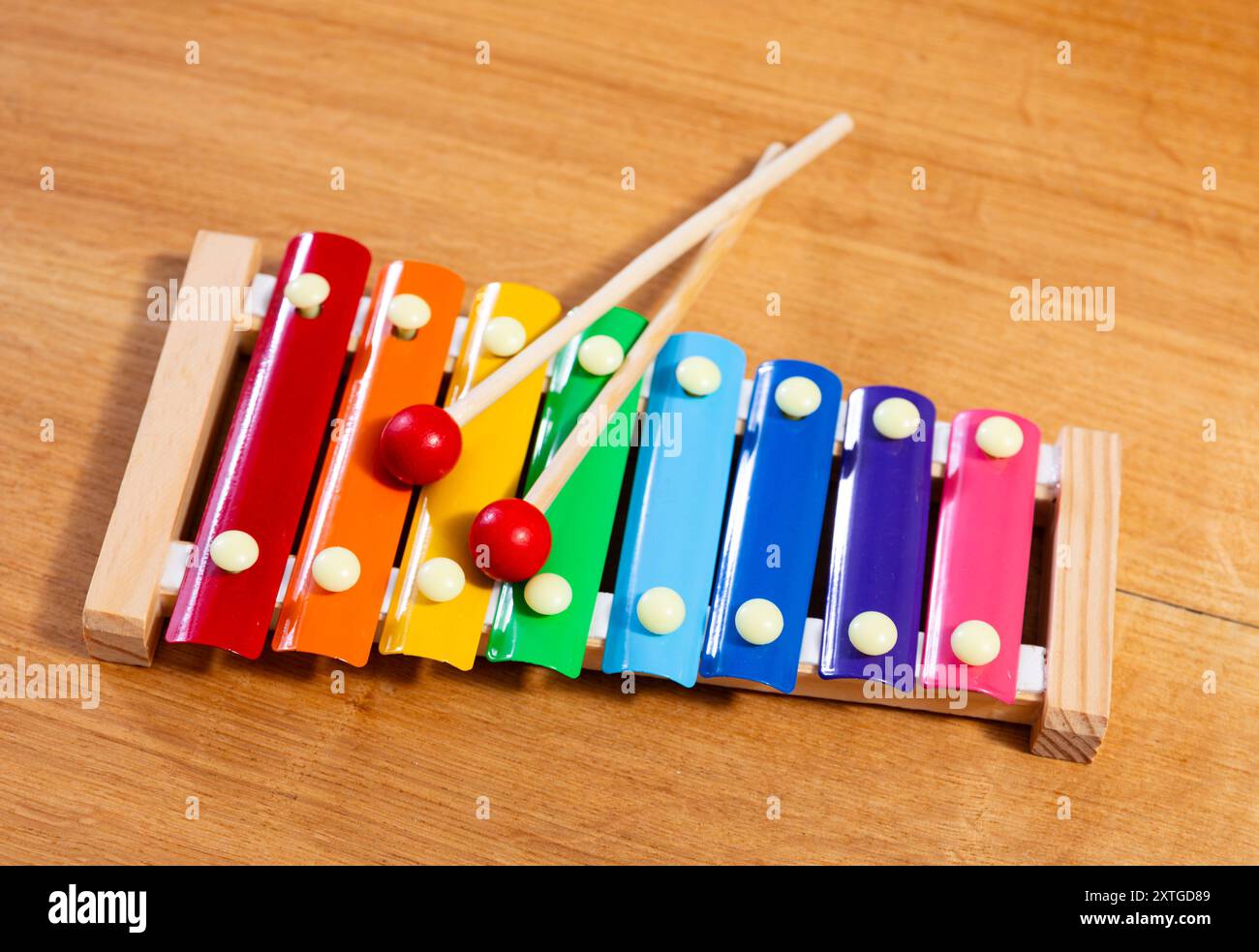 Kids xylophone with rainbow metal bars and wooden mallets Stock Photo ...
