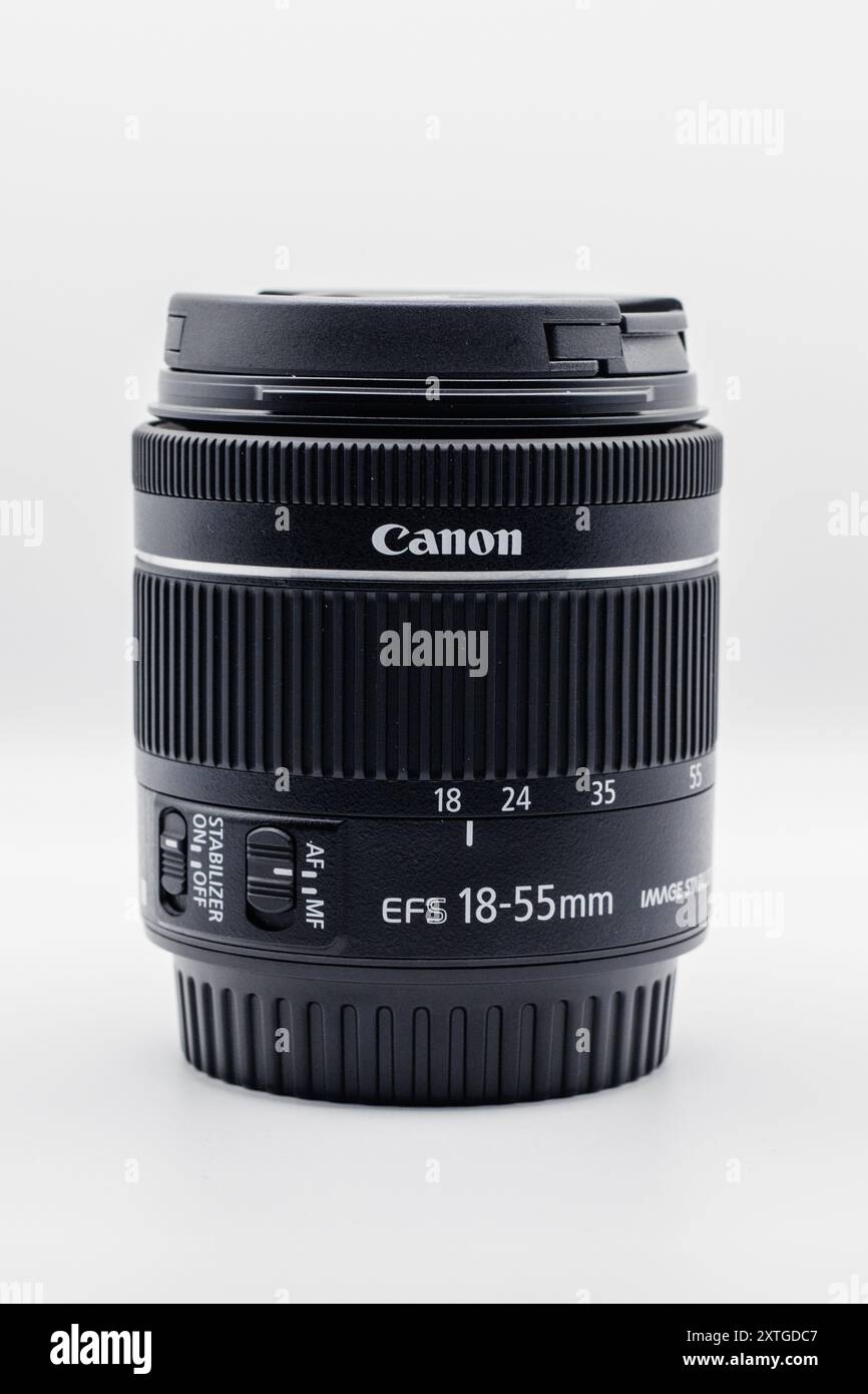 Canon camera lens vertical on white background Stock Photo - Alamy