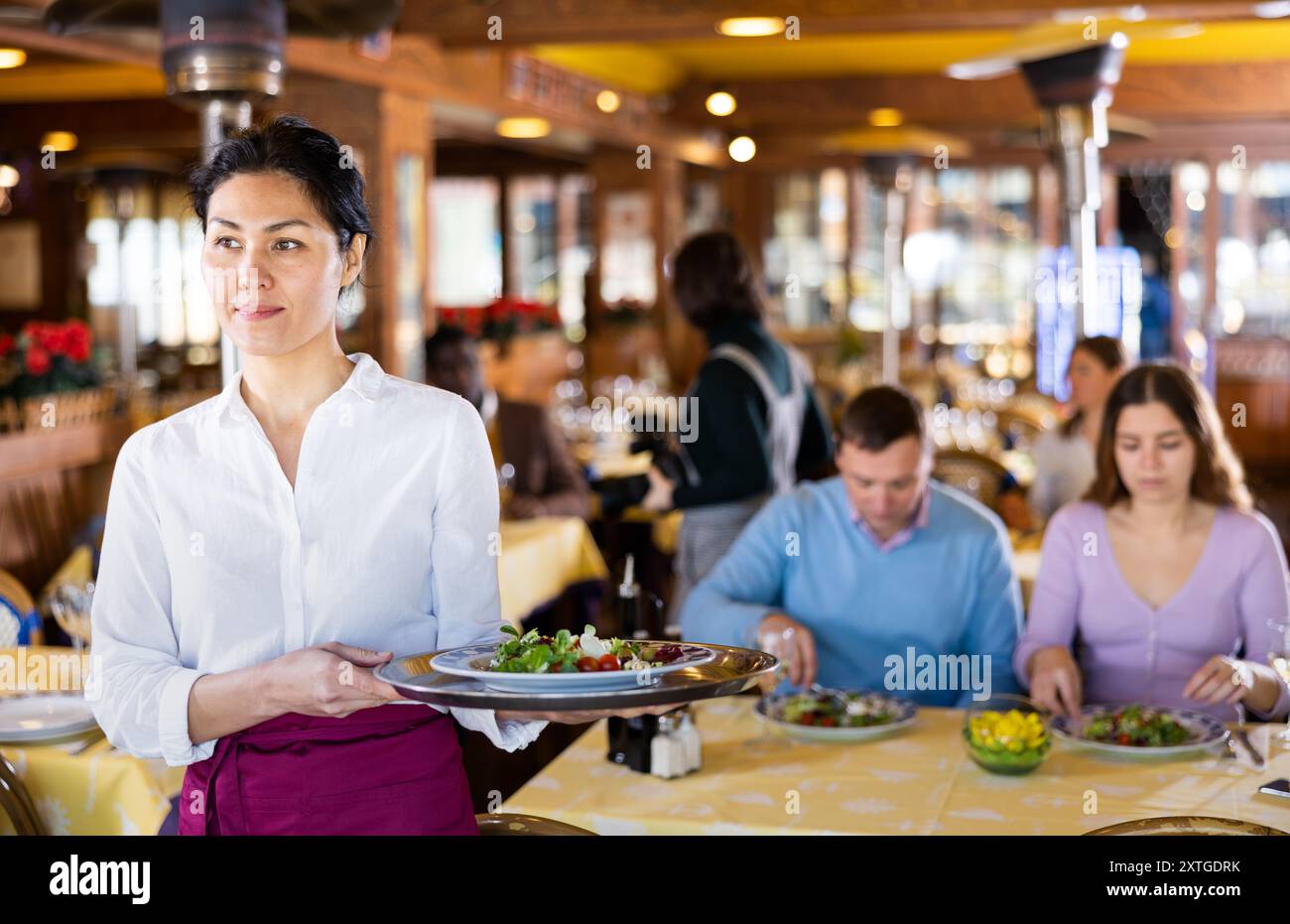 Thai waitress serving food hi-res stock photography and images - Alamy