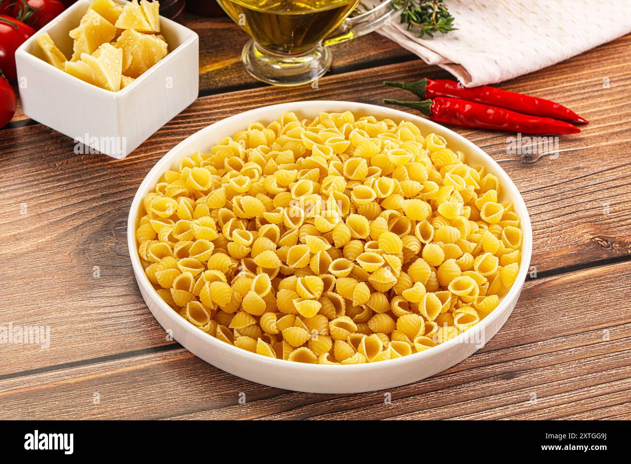 Italian cuisine - dry conchiglie shell pasta Stock Photo - Alamy