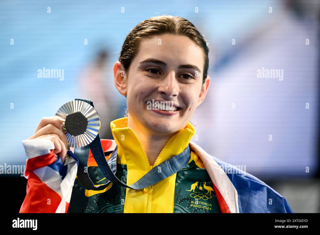 Maddison Keeney of Australia shows the medal of the diving 3m ...