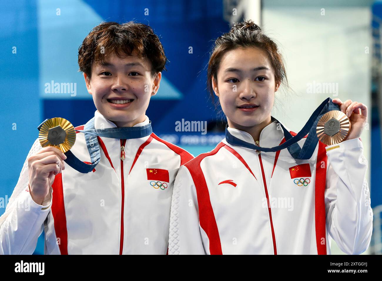 Yiwen Chen of China, gold, and Yani Chang of China, bronze show the ...