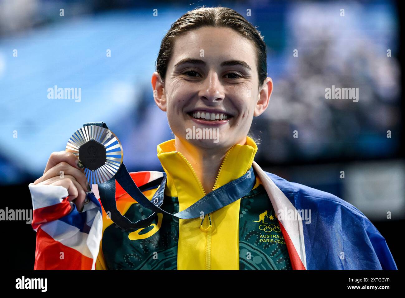 Maddison Keeney of Australia shows the medal of the diving 3m ...